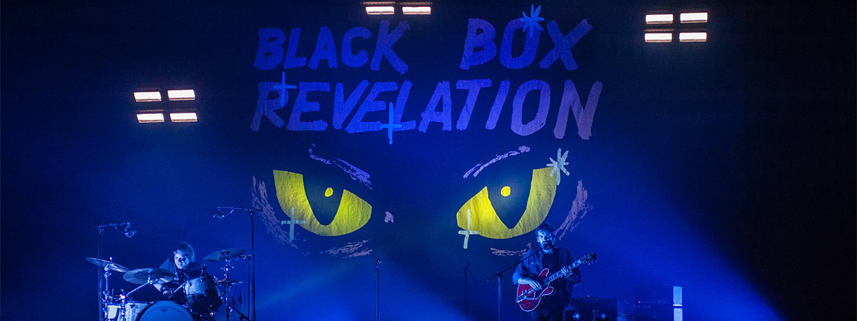 The Black Box Revelation on tour with a hand-painted cyclorama