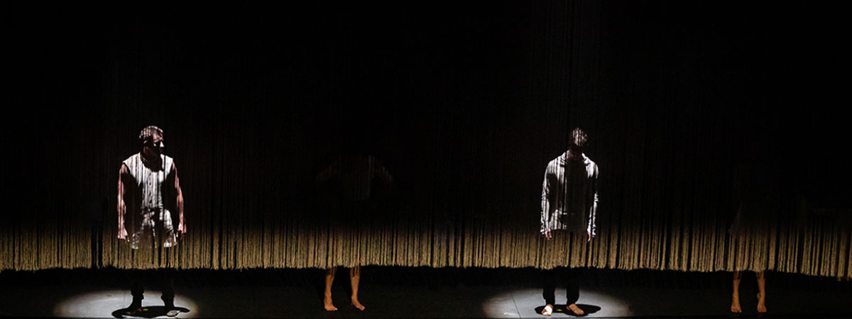 MUTE - Light effects and projection on a string-curtain backdrop