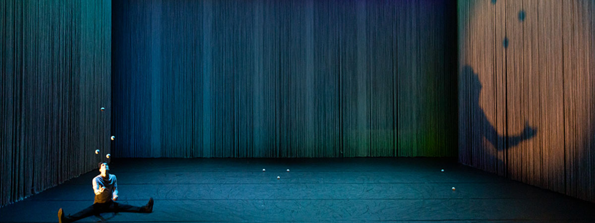 MUTE - Light effects and projection on a string-curtain backdrop