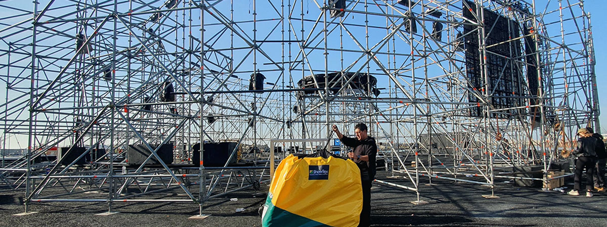 Translucent mesh creates intimate festival atmosphere